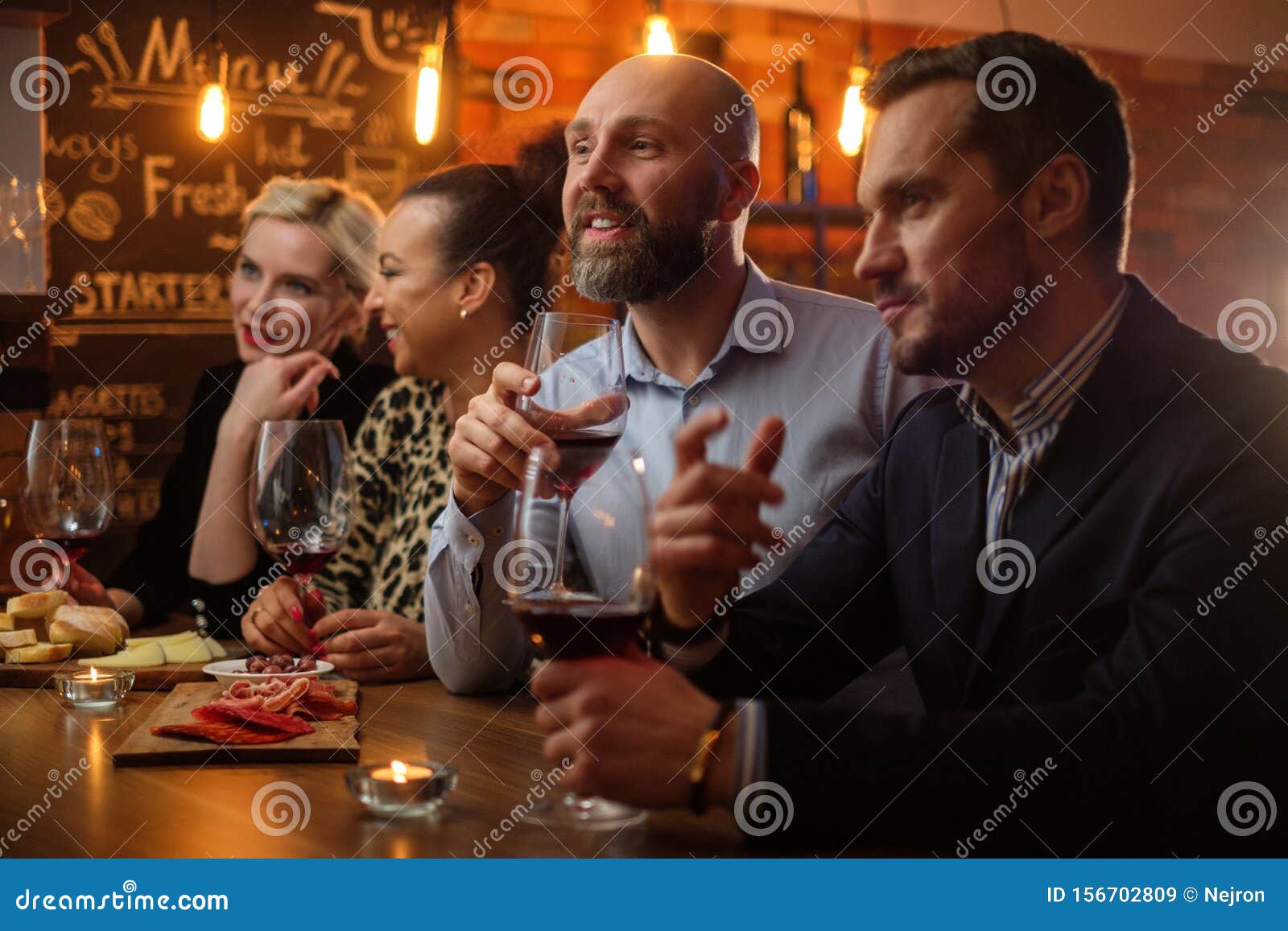 Group of Friends Having Fun Talk Behind Bar Counter in a Cafe Stock ...