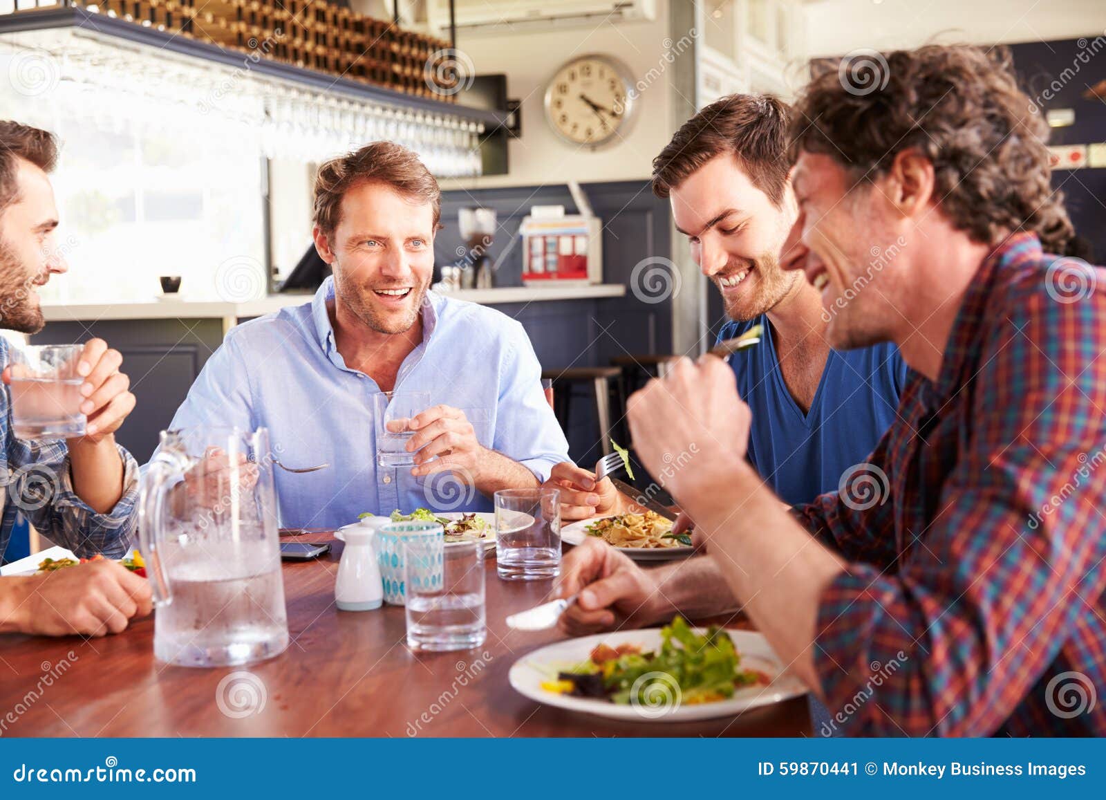 A Group of Friends Having Lunch in a Restaurant Stock Image - Image of ...