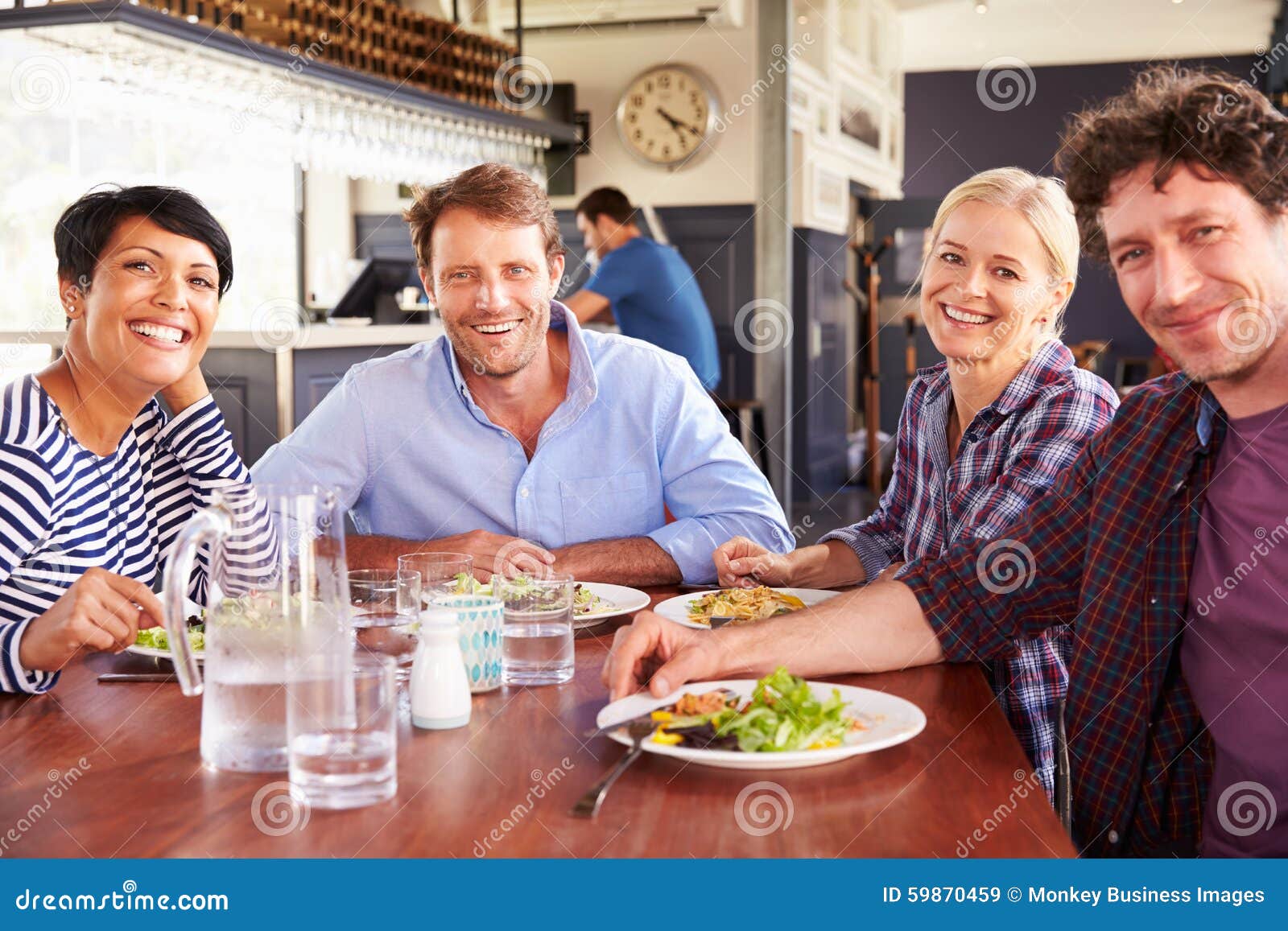 A Group of Friends Having Lunch in a Restaurant Stock Image - Image of ...