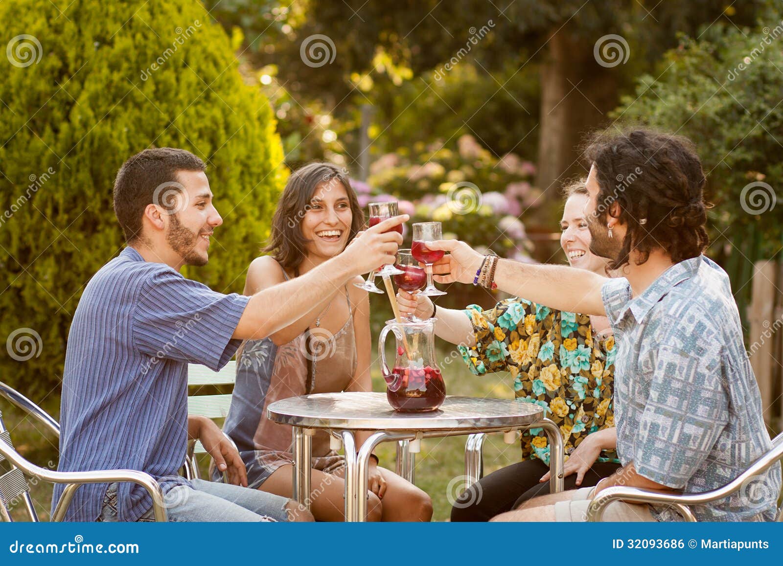Group of Friends Having a Toast Stock Photo - Image of clink, cheerful ...