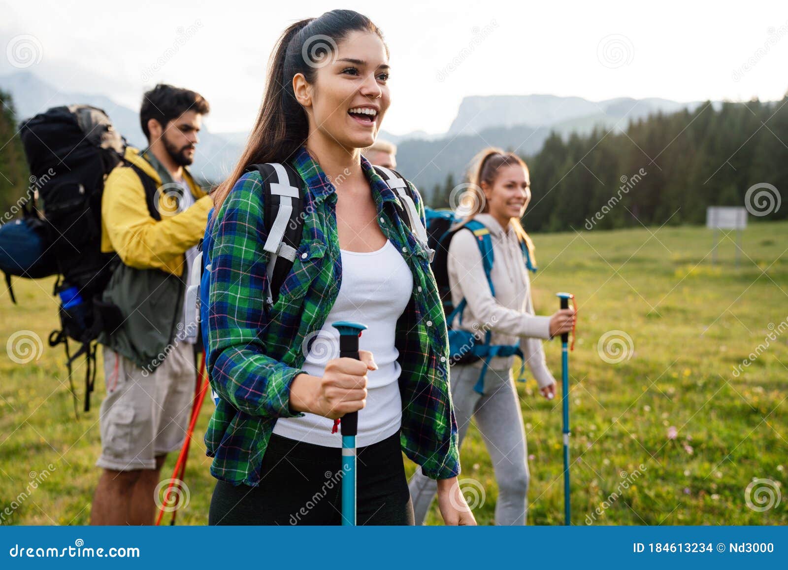 Group of Friends Hiking Together Outdoors Exploring the Wilderness and ...