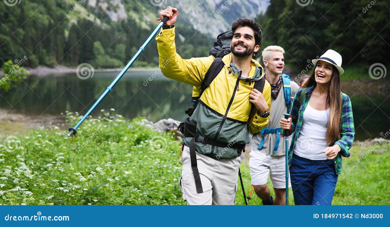 Group of Friends Hiking Together Outdoors Exploring the Wilderness and ...