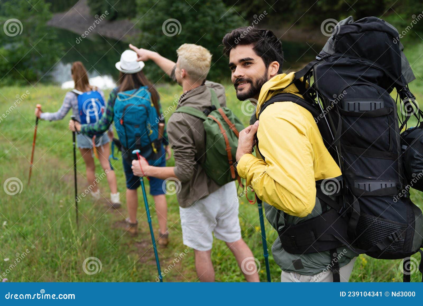 Group of Friends Hiking Together Outdoors Exploring the Wilderness and ...
