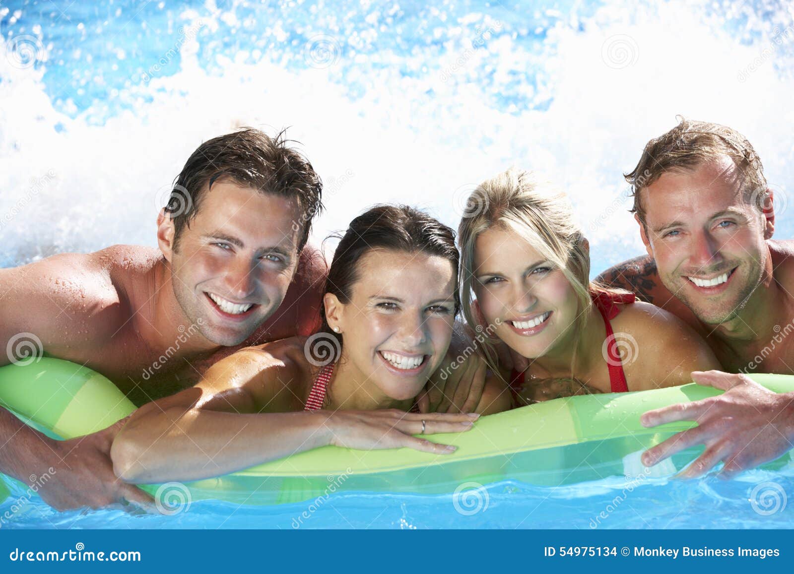 Group of Friends on Holiday in Swimming Pool Stock Photo - Image of ...