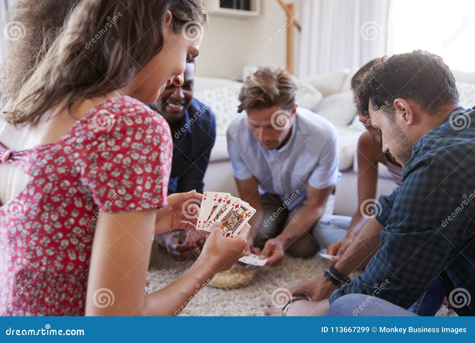 Group of Friends at Home Playing Cards Together Stock Image - Image of ...