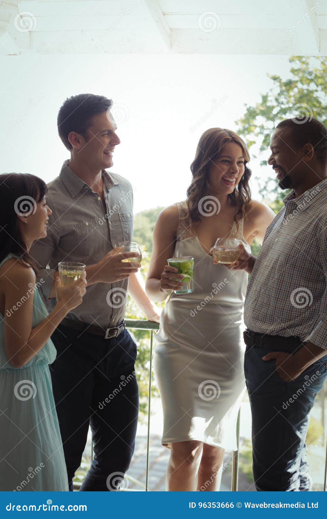 Group of Friends Interacting with Each Other while Having Cocktail ...