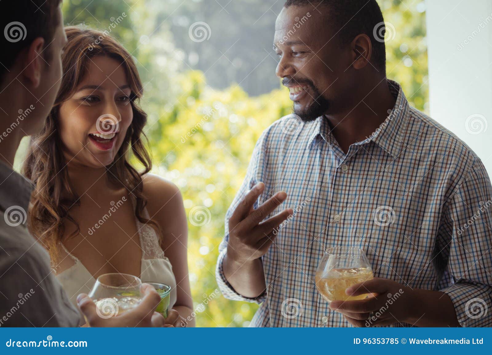 Group of Friends Interacting with Each Other while Having Cocktail ...