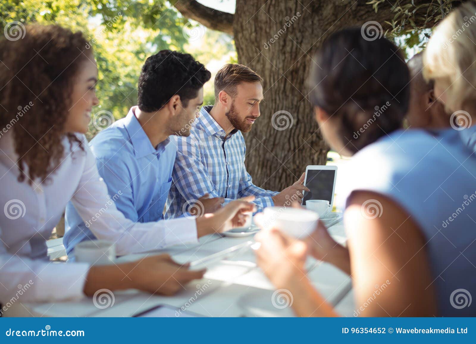 Group of Friends Interacting with Each Other Stock Photo - Image of ...