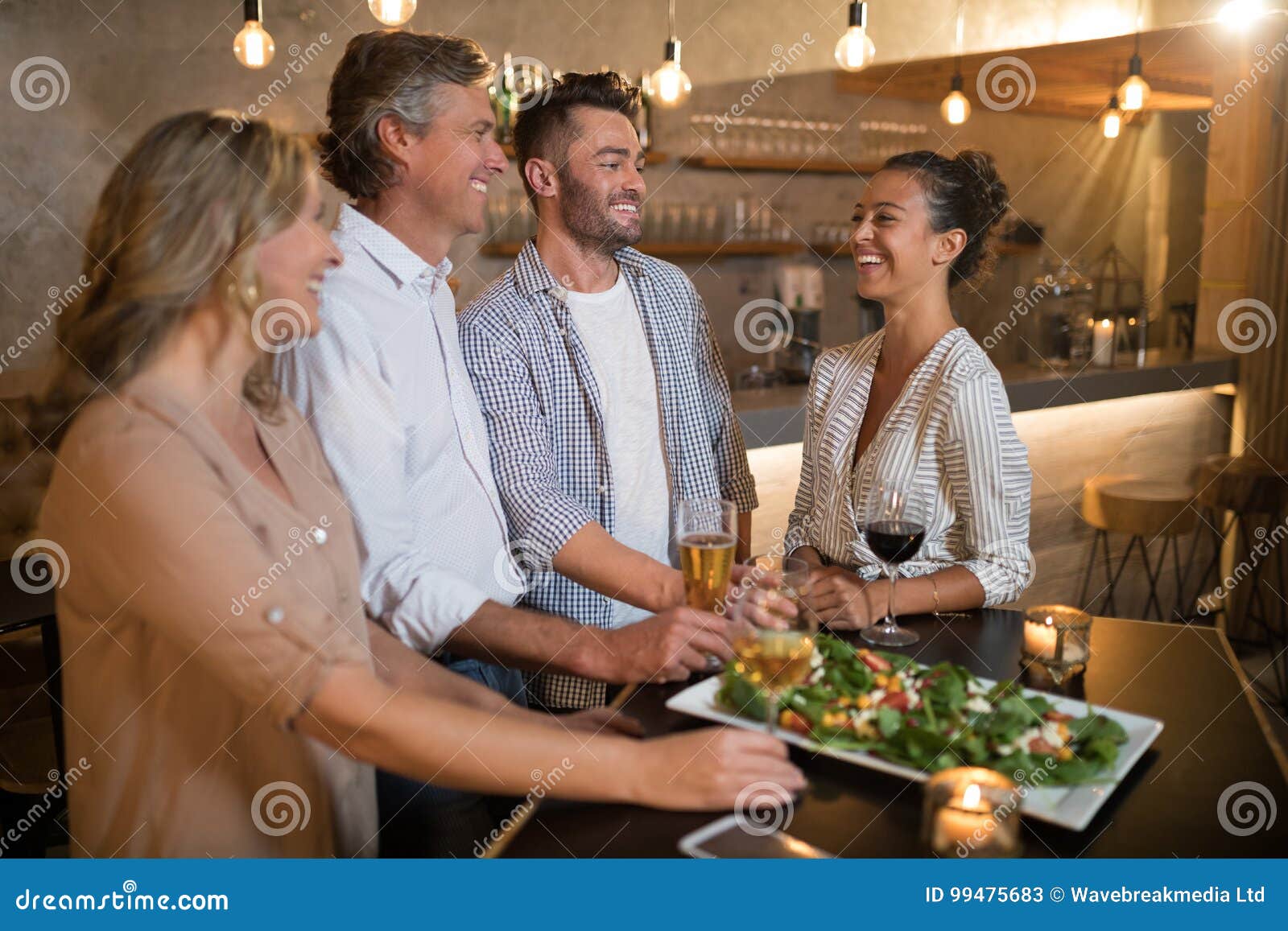 Group of Friends Interacting with Each Other Stock Image - Image of ...