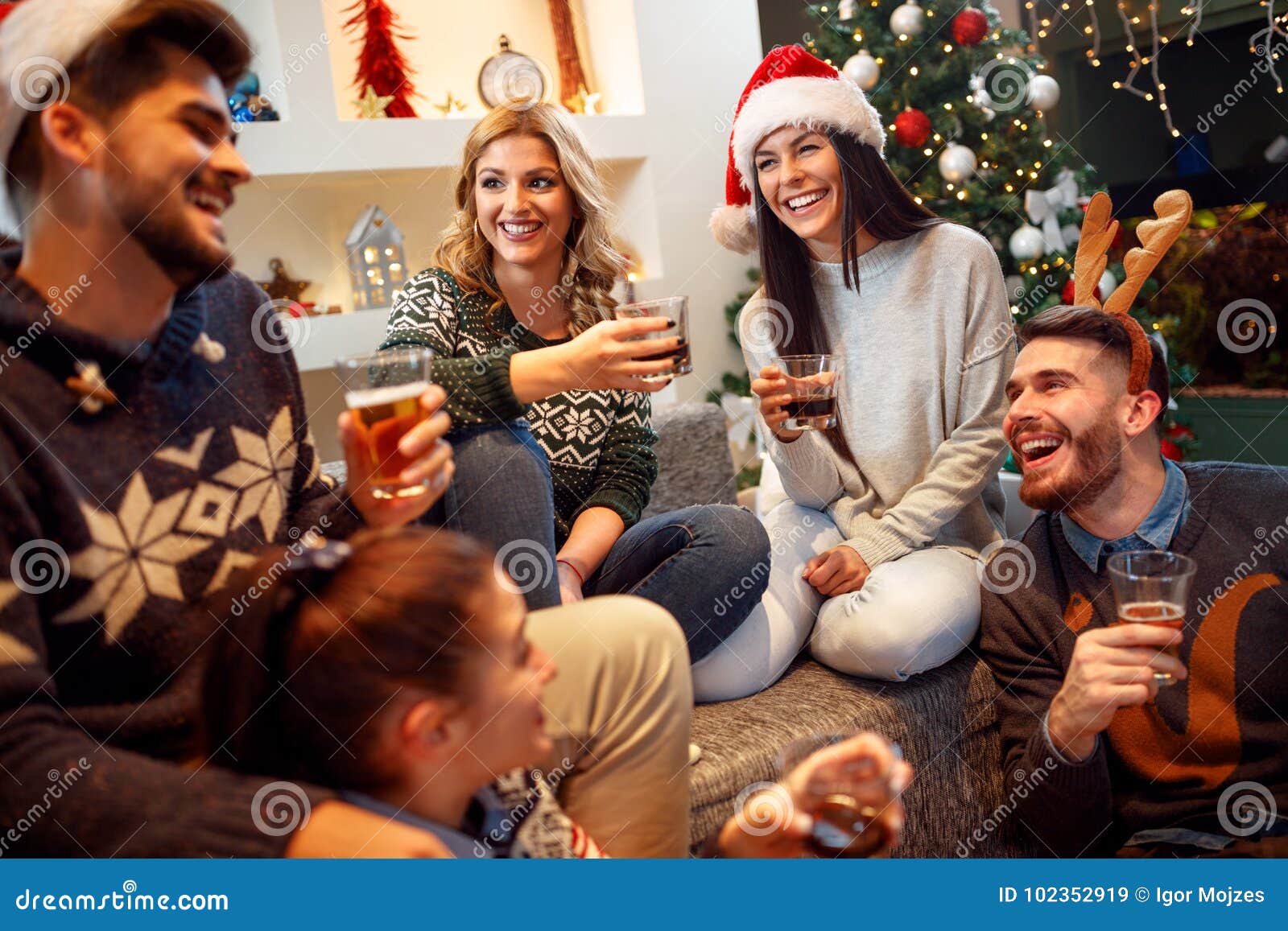 Friends Laughing on Christmas Party Stock Image - Image of party ...