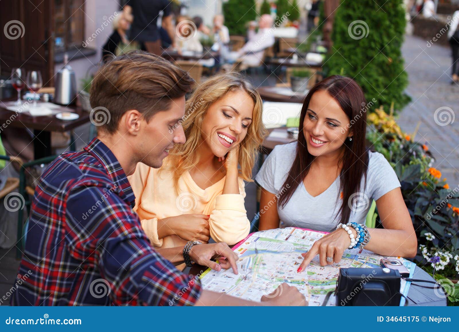Group of friends with map stock image. Image of outside - 34645175