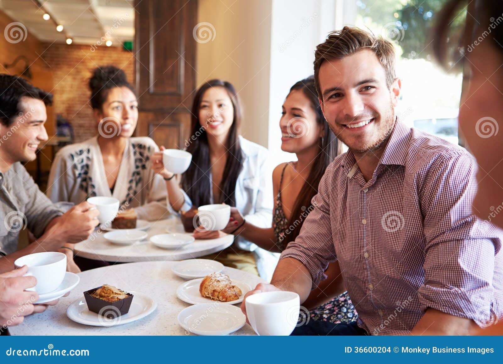 Group of Friends Meeting in Cafe Restaurant Stock Photo - Image of race ...