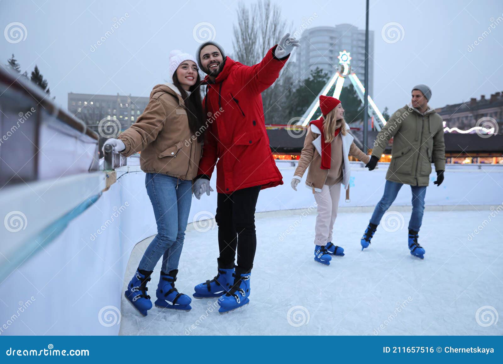 Group of Friends at Outdoor Ice Skating Rink Stock Photo - Image of ...