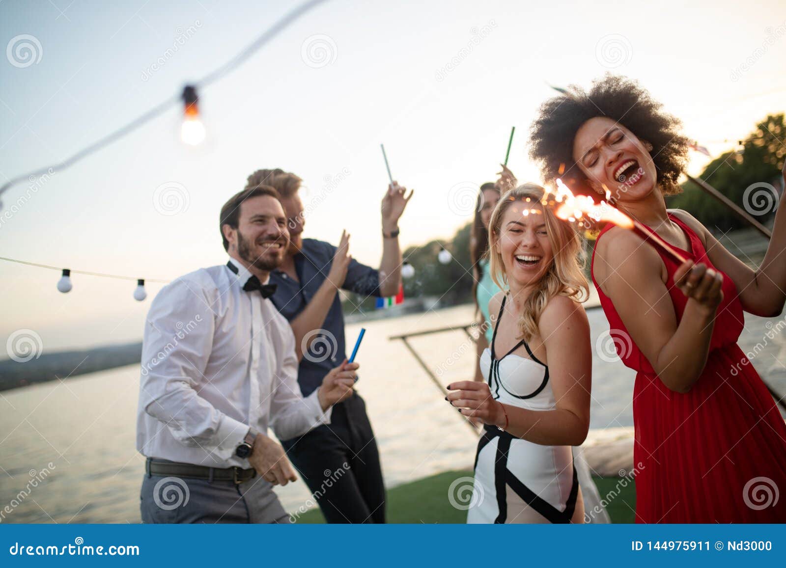 Group of Friends at Party Dancing and Smiling Together Stock Image ...