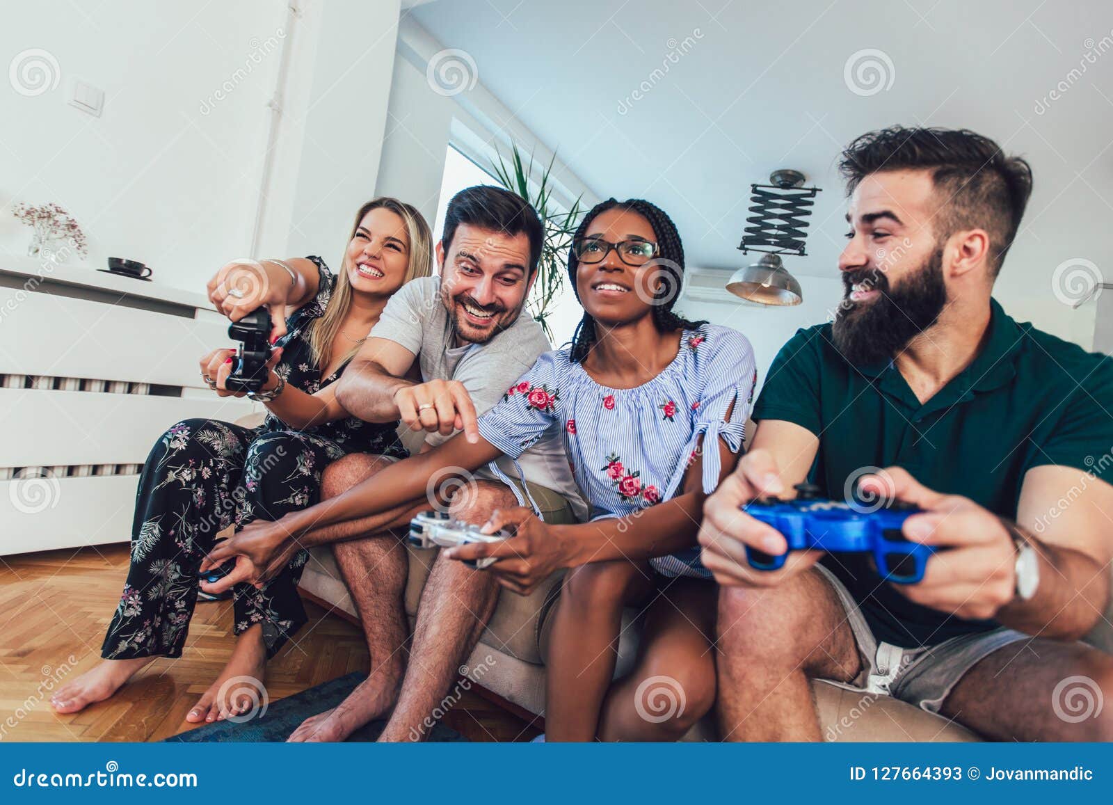 Group of Friends Play Video Games Stock Image - Image of home ...