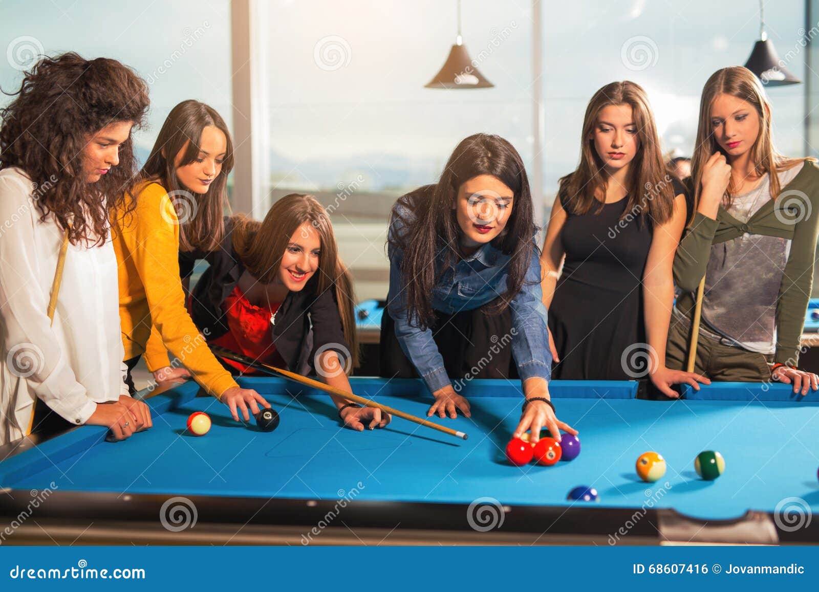Group of Friends Playing Pool Together. Stock Photo - Image of sport ...