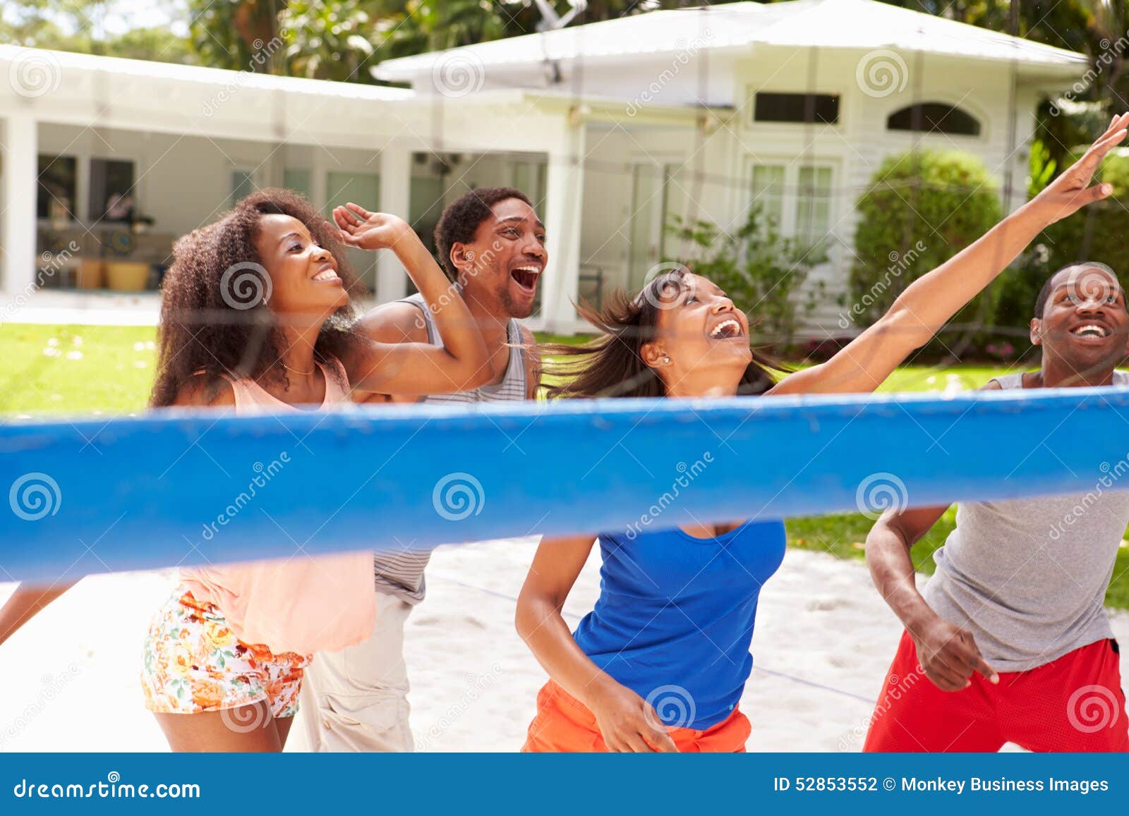 Group of Friends Playing Volleyball Match Stock Photo - Image of four ...