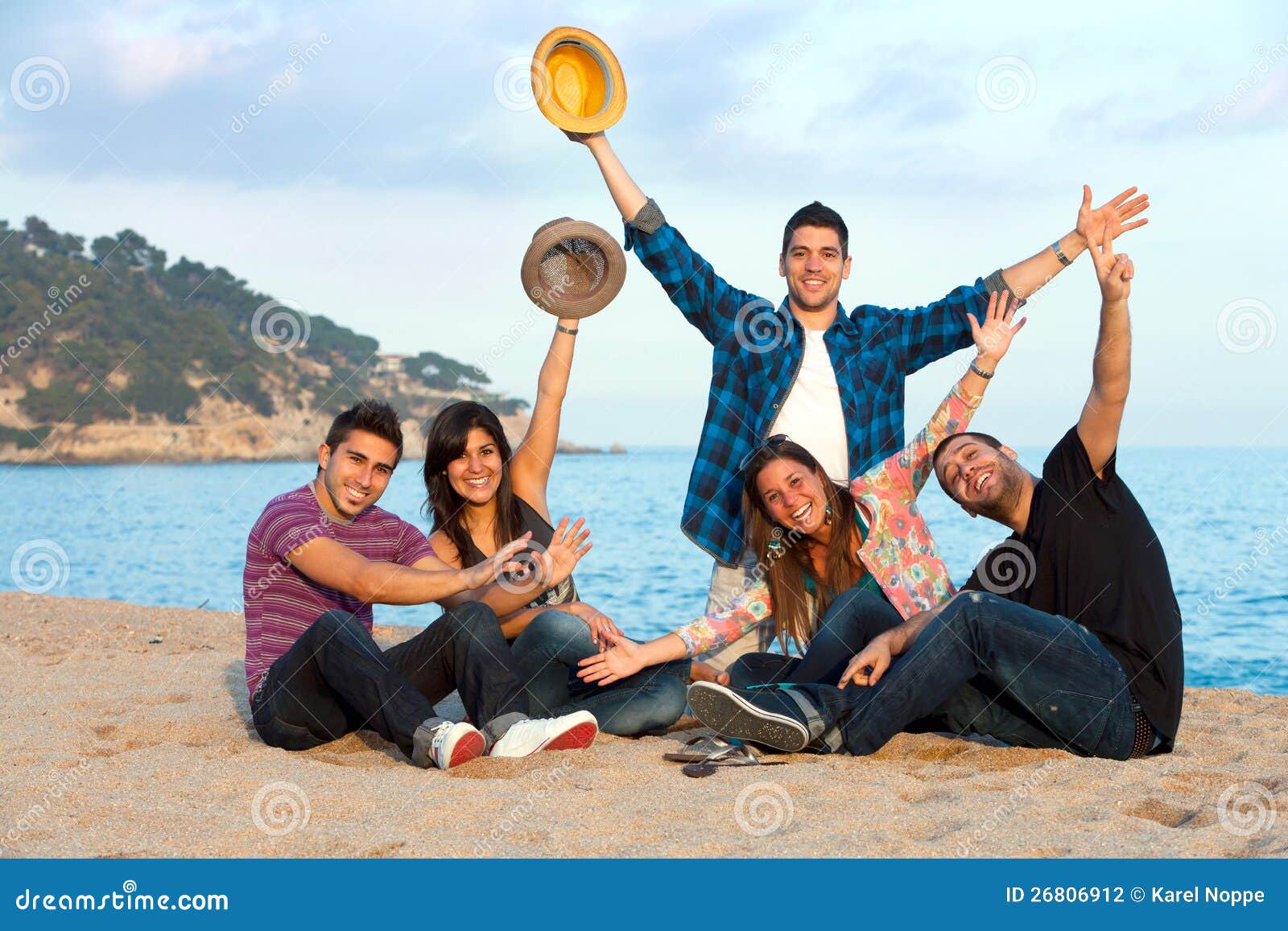 Group of Friends Raising Hands on Beach. Stock Photo - Image of ...