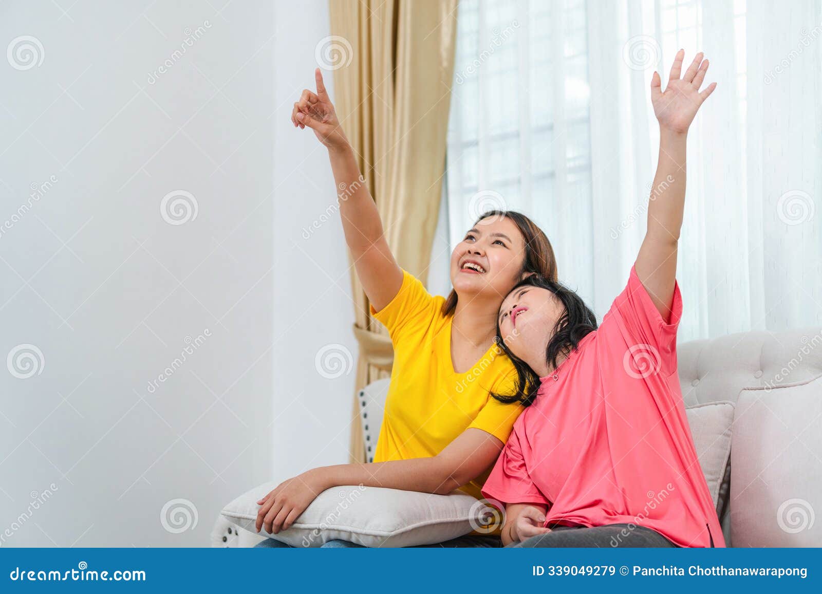 A Group of Friends Relaxing and Having Fun in Living Room Stock Image ... A Group of Friends Relaxing and Having Fun in Living Room Stock Image ...