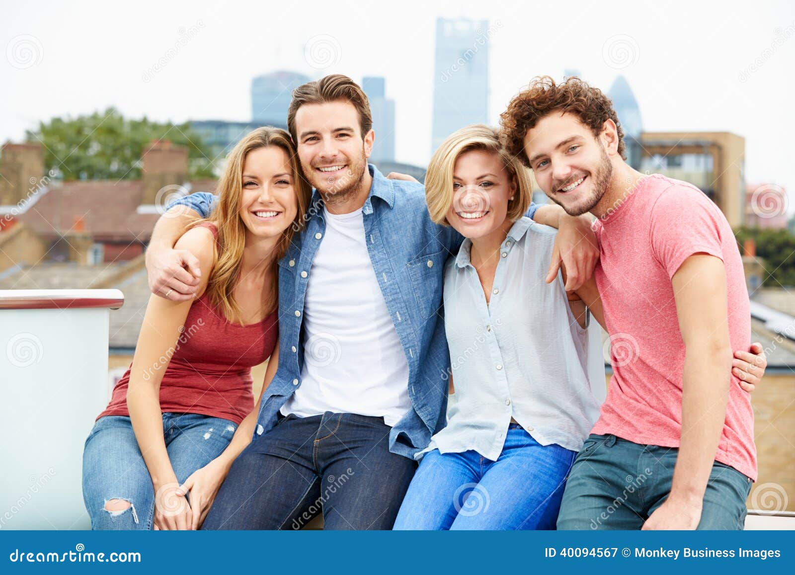 Group of Friends Relaxing Together on Rooftop Terrace Stock Image ...