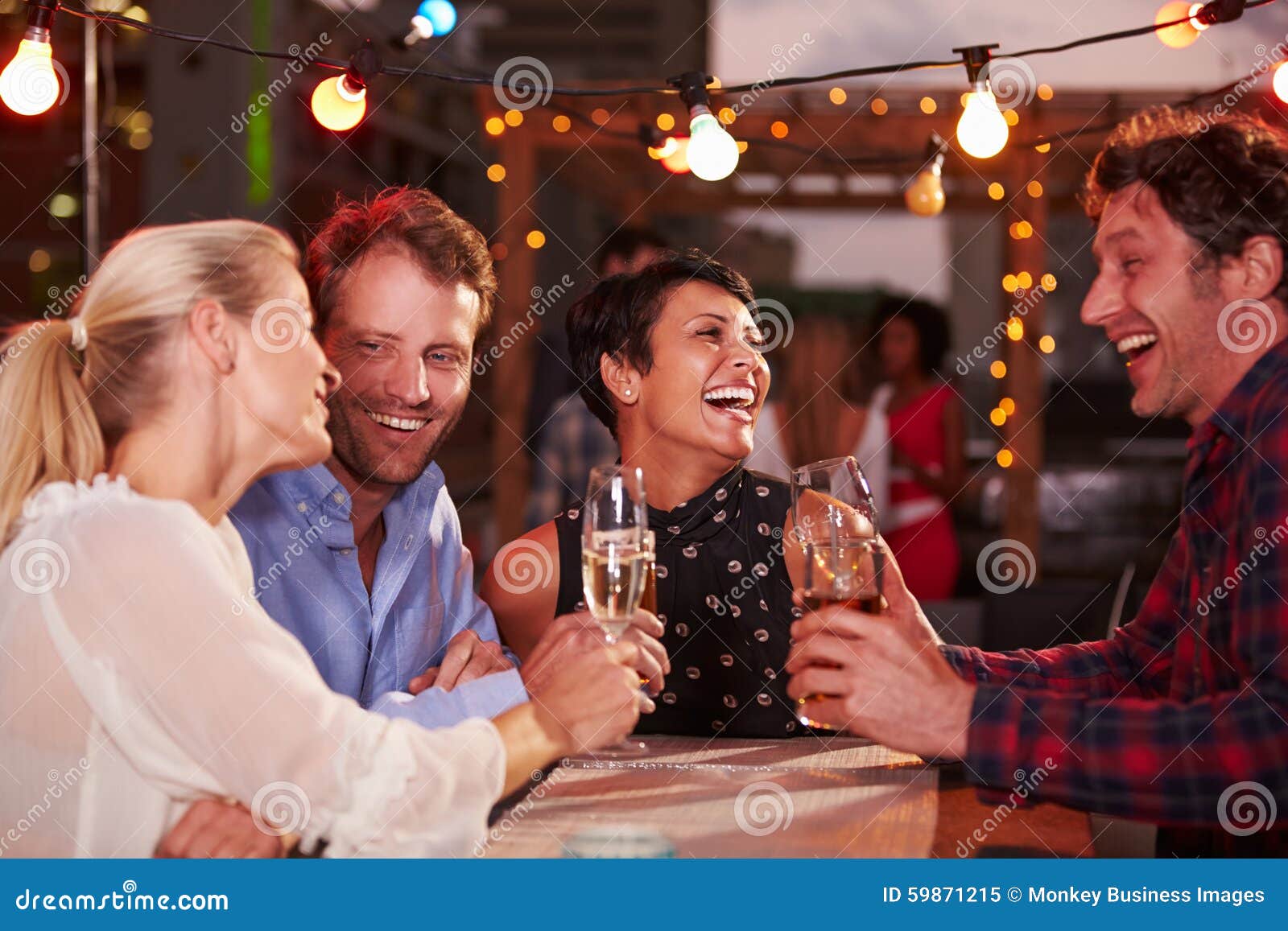 Group of Friends at Rooftop Party Stock Image - Image of group, alcohol ...