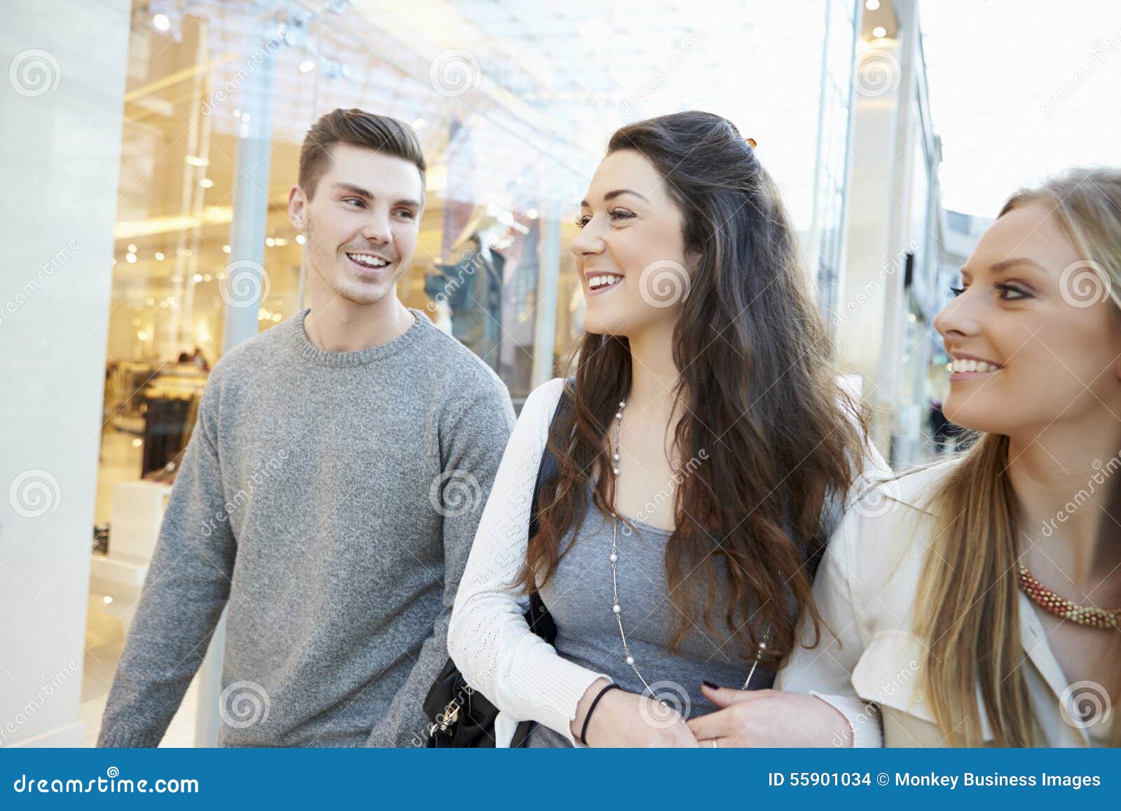 Group of Friends Shopping in Mall Together Stock Photo - Image of ...