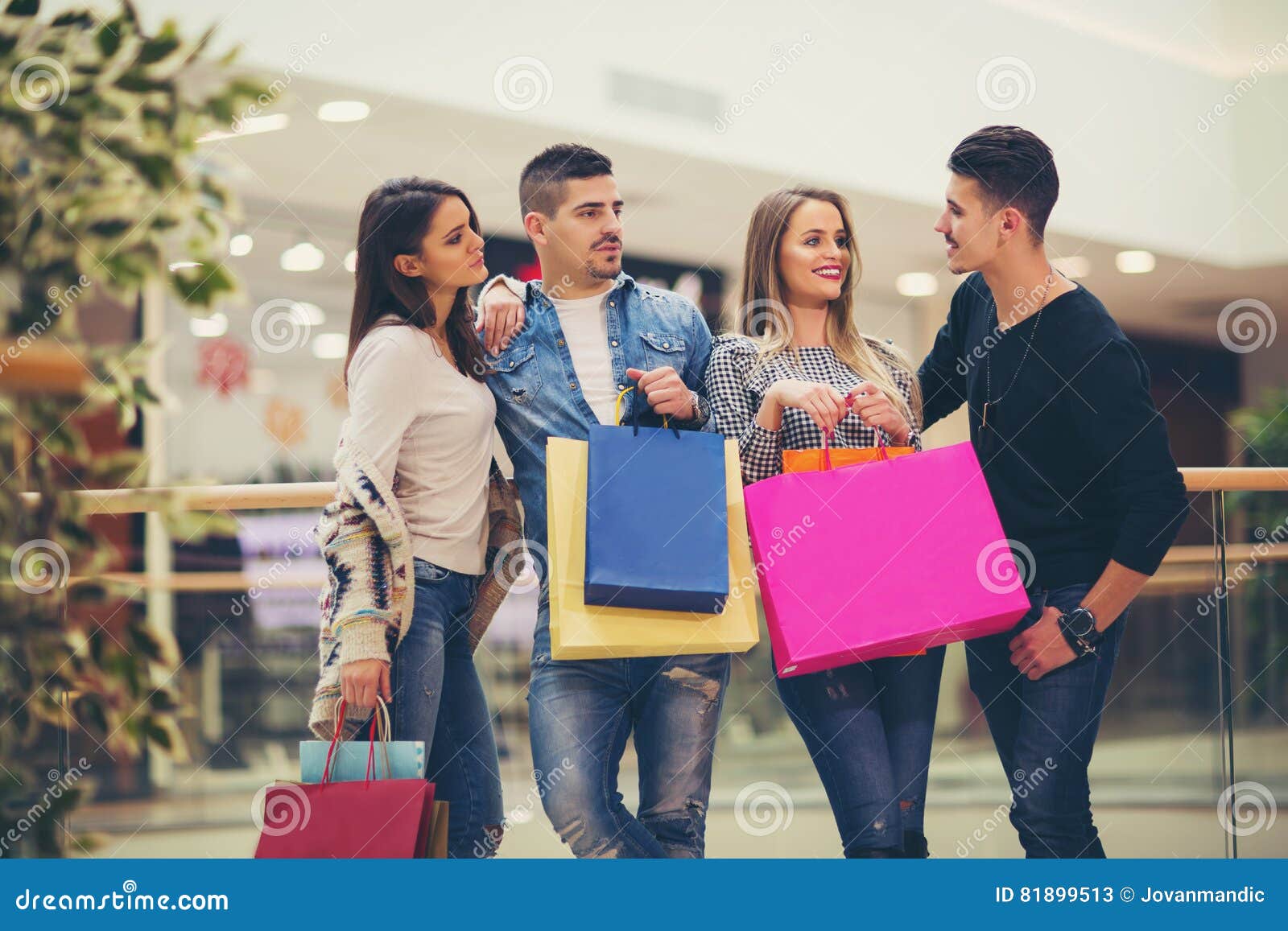 Group of Friends Shopping in Mall Together Stock Image - Image of ...