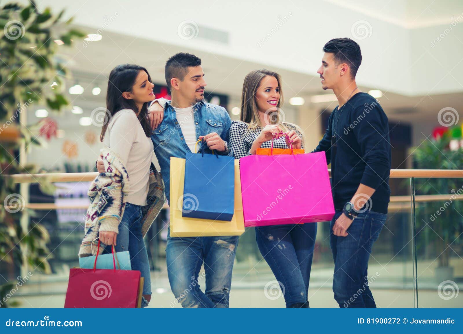 Group of Friends Shopping in Mall Together Stock Photo - Image of ...