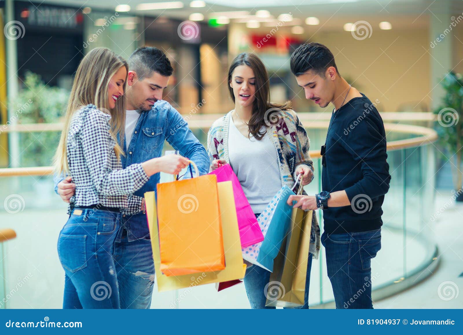 Group of Friends Shopping in Mall Together Stock Image - Image of ...