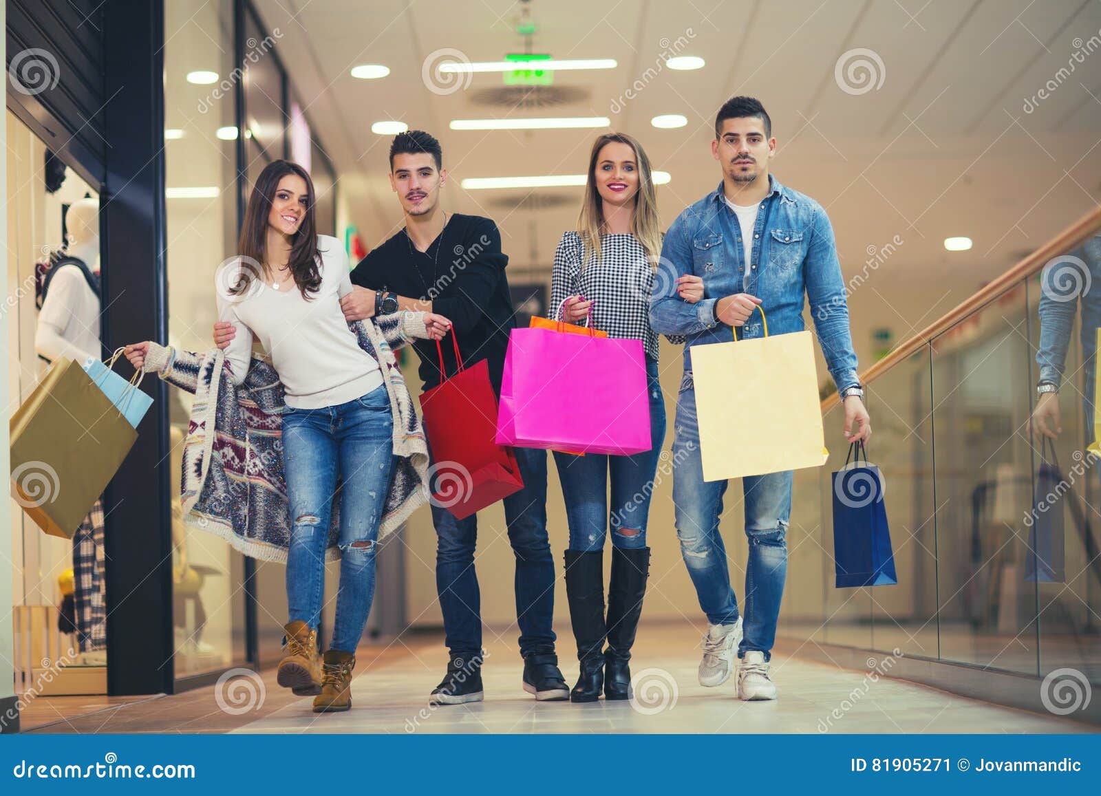 Group of Friends Shopping in Mall Together Stock Image - Image of ...