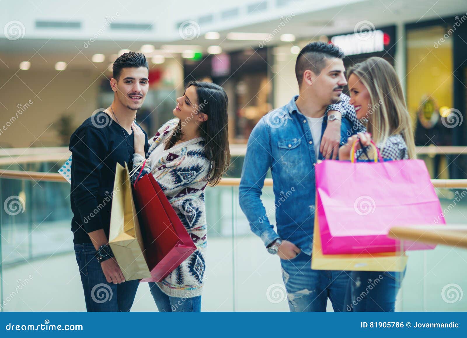 Group of Friends Shopping in Mall Together Stock Photo - Image of ...