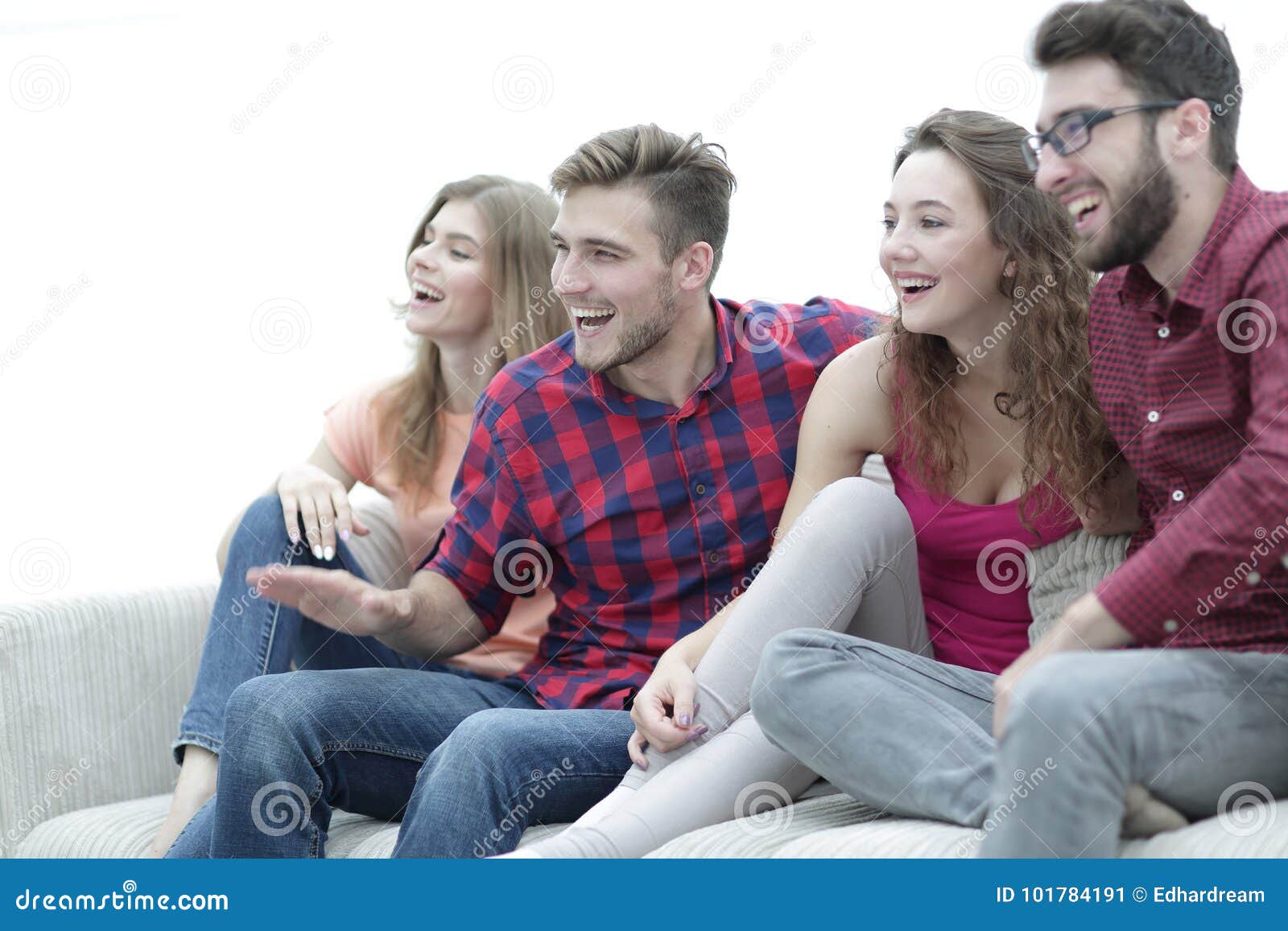 Young Friends Sitting on the Couch and Rooting for Their Favorite Team ...