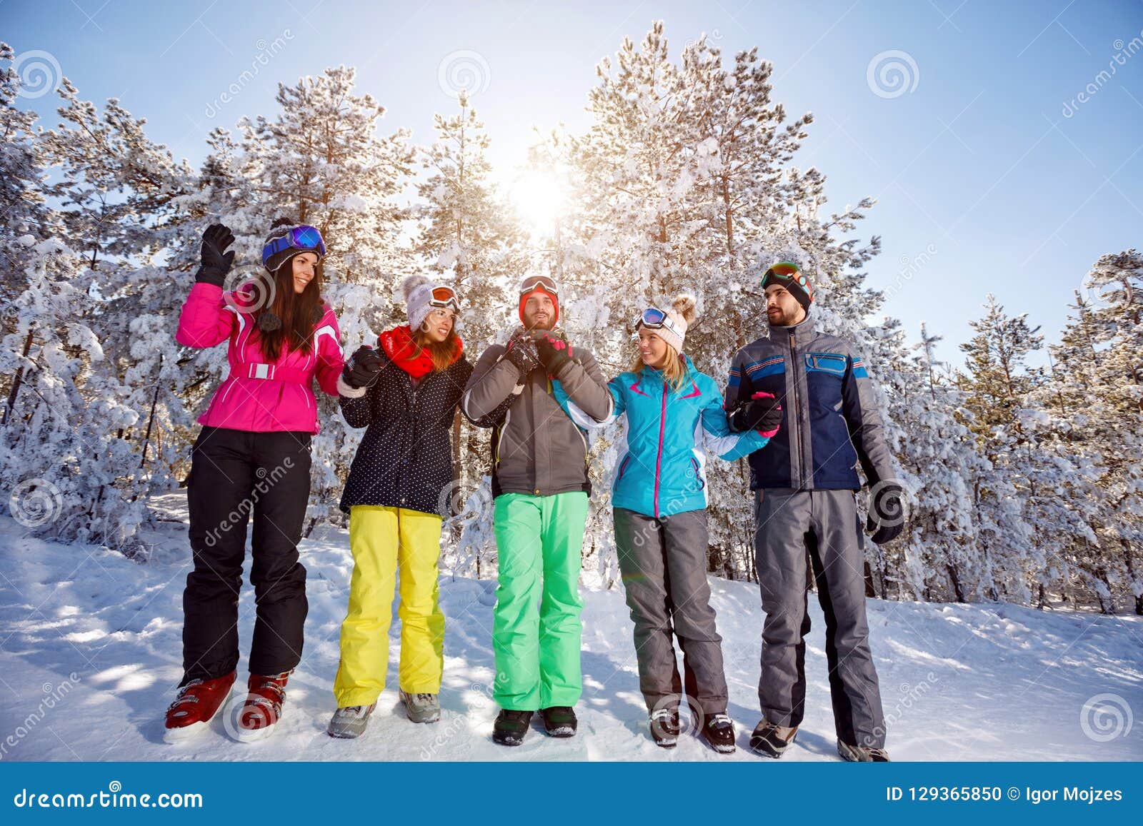 Group of Friends on Snow in Forest Stock Photo - Image of skis, holding ...