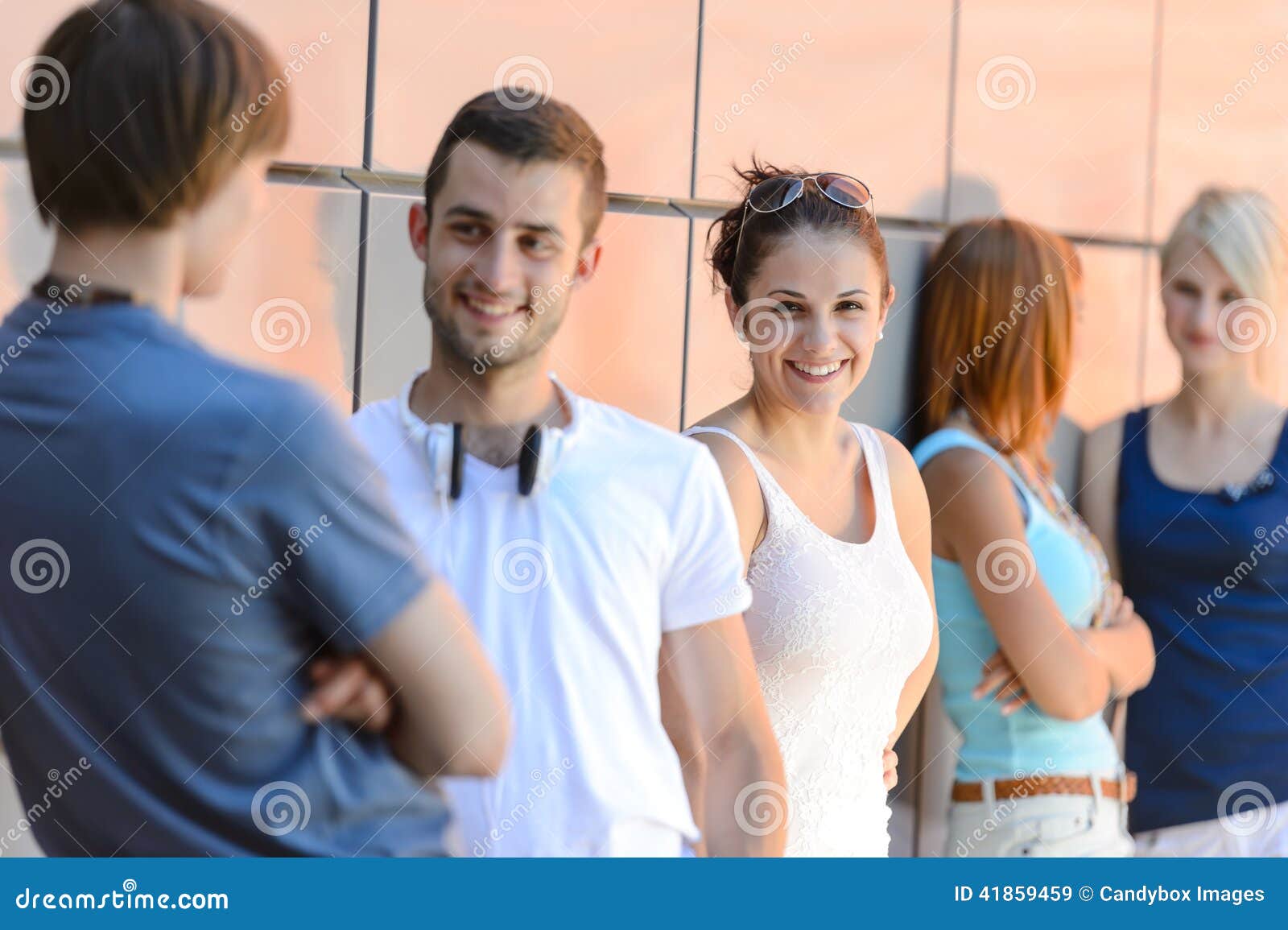 Group of Friends Students Leaning Against Wall Stock Image - Image of ...