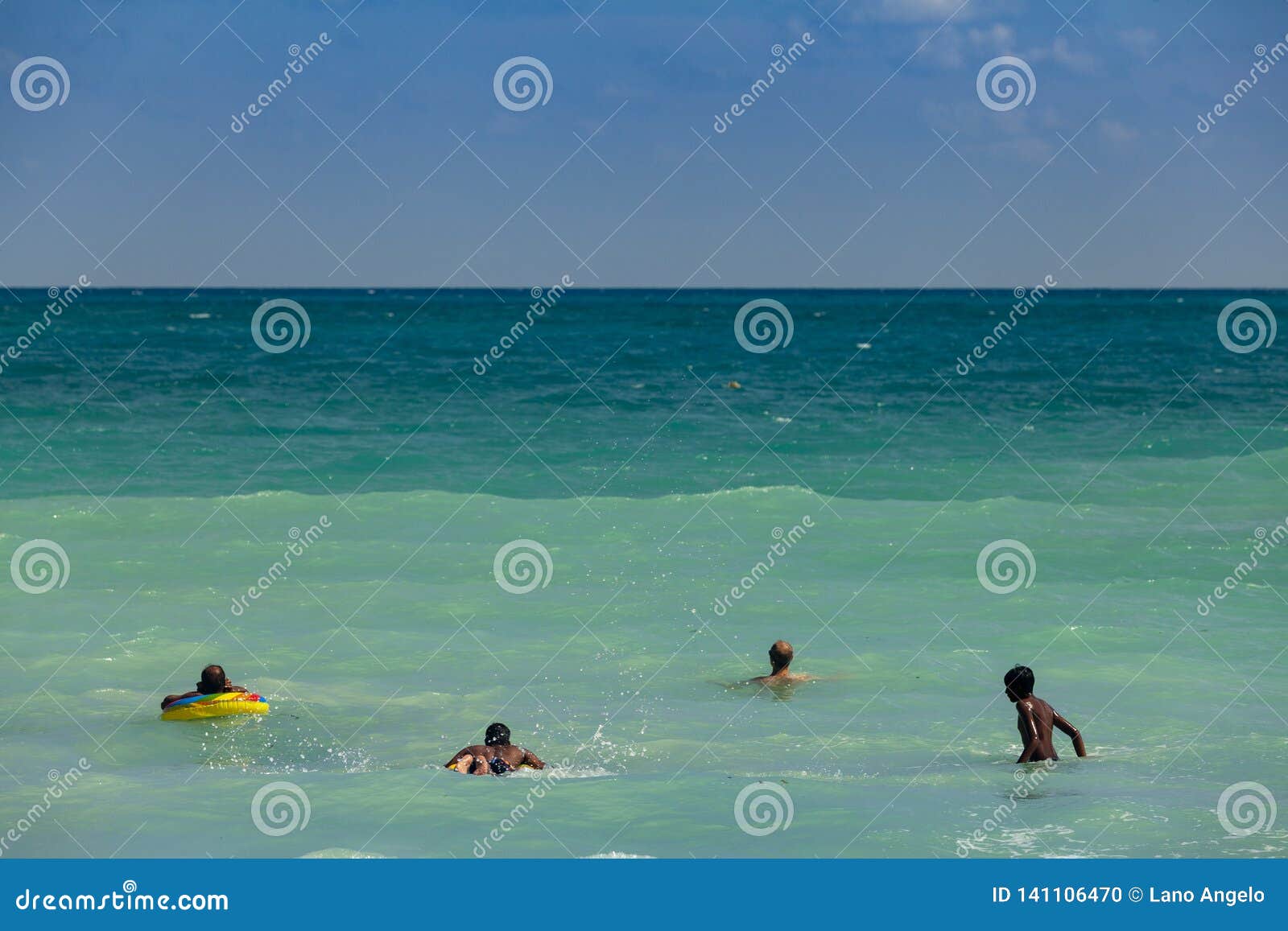 Group of Friends Swimming in the Ocean Stock Photo - Image of ocean ...
