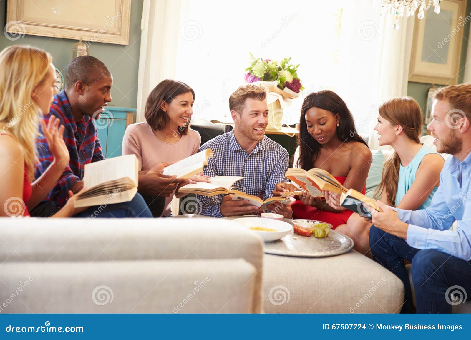 Group of Friends Taking Part in Book Club at Home Stock Photo - Image ...