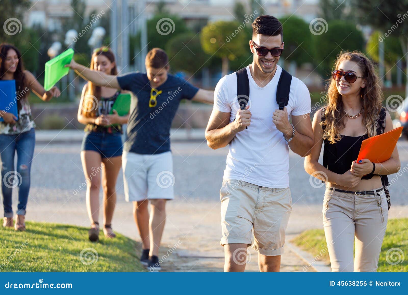 A Group of Friends Talking in the Street after Class Stock Photo ...