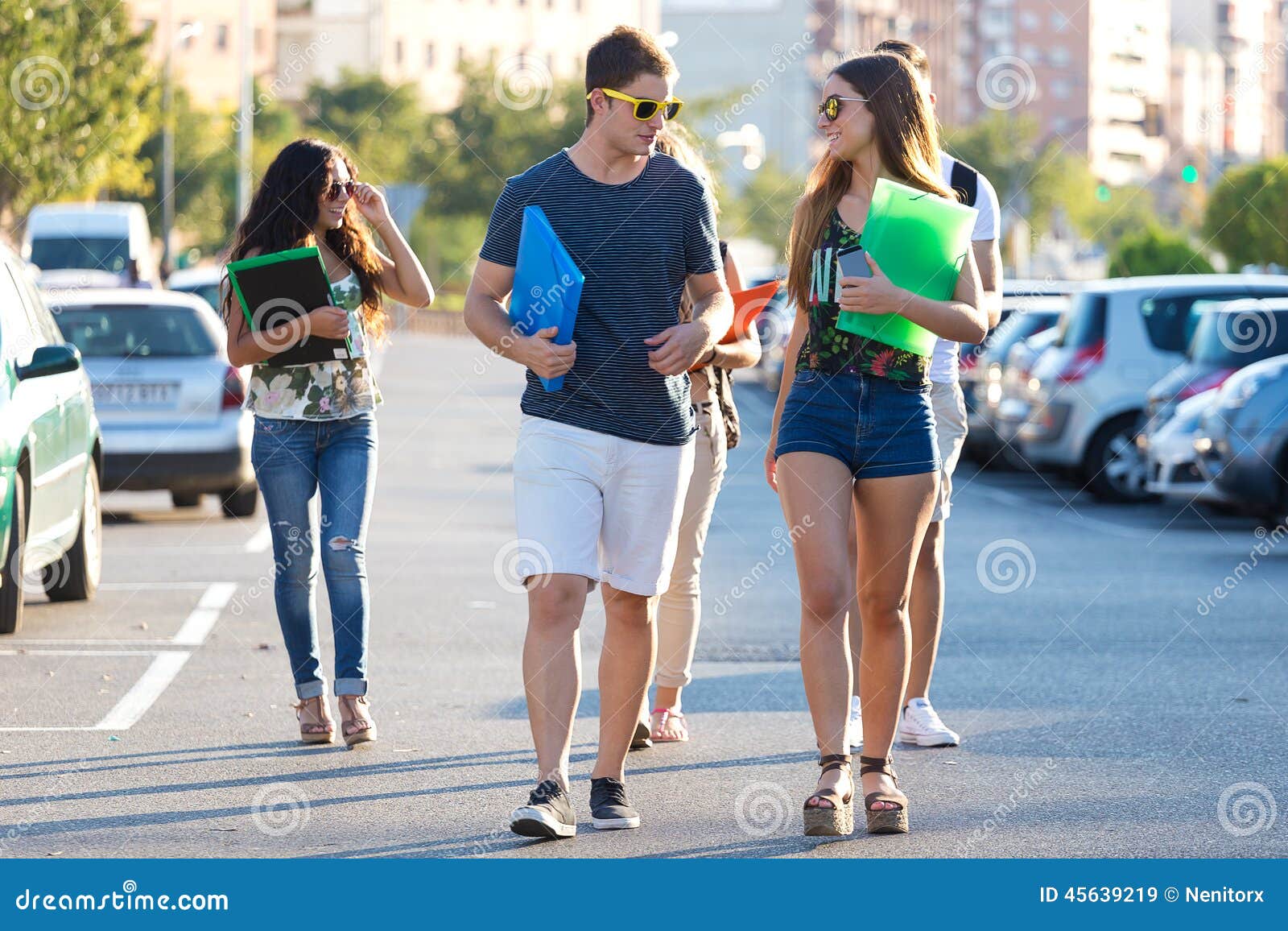 A Group of Friends Talking in the Street after Class Stock Image ...