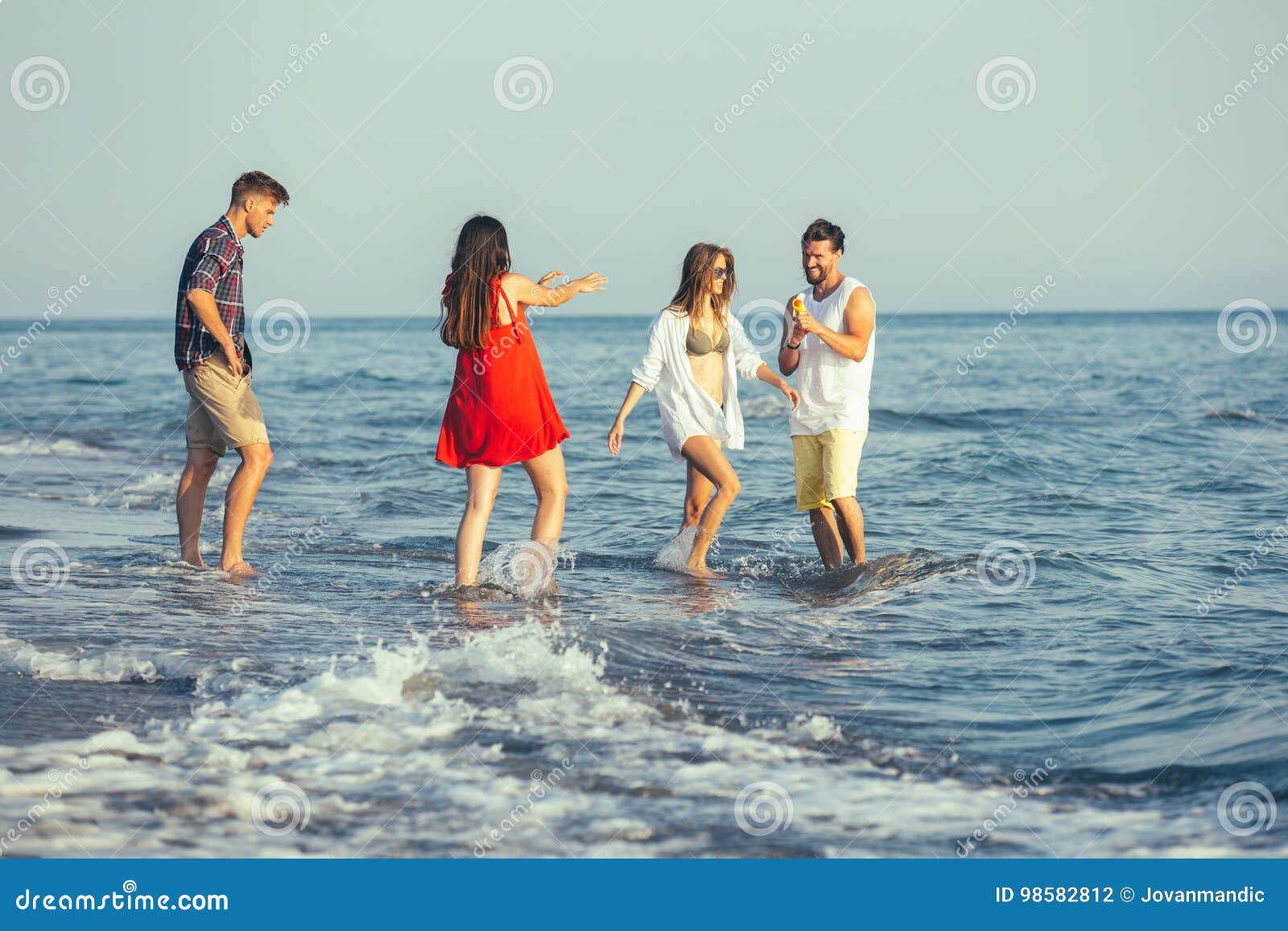 Group of Friends Together on the Beach Stock Photo - Image of coastline ...