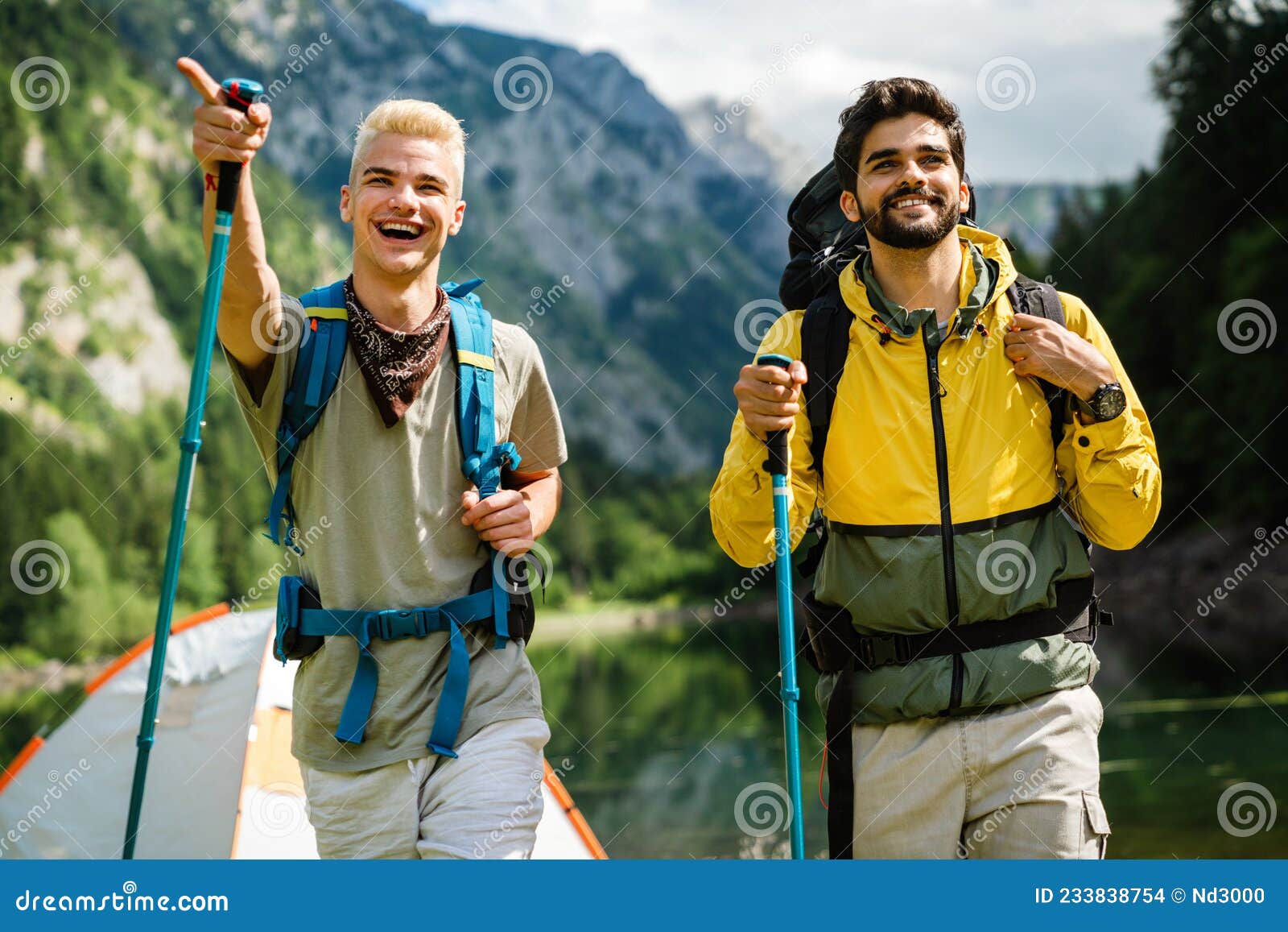 Group of Friends Trekking with Backpacks Walking in the Forest . Stock ...