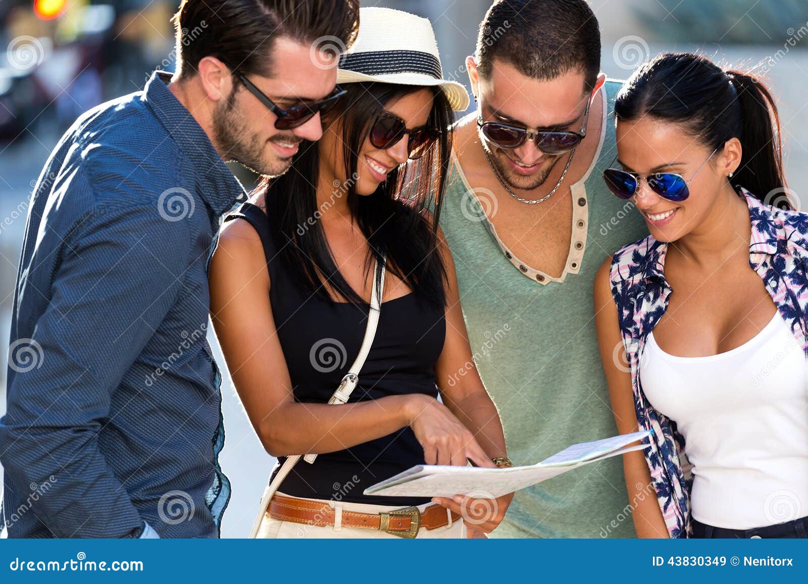 Group of Friends Use Their Map in the Street. Stock Image - Image of ...