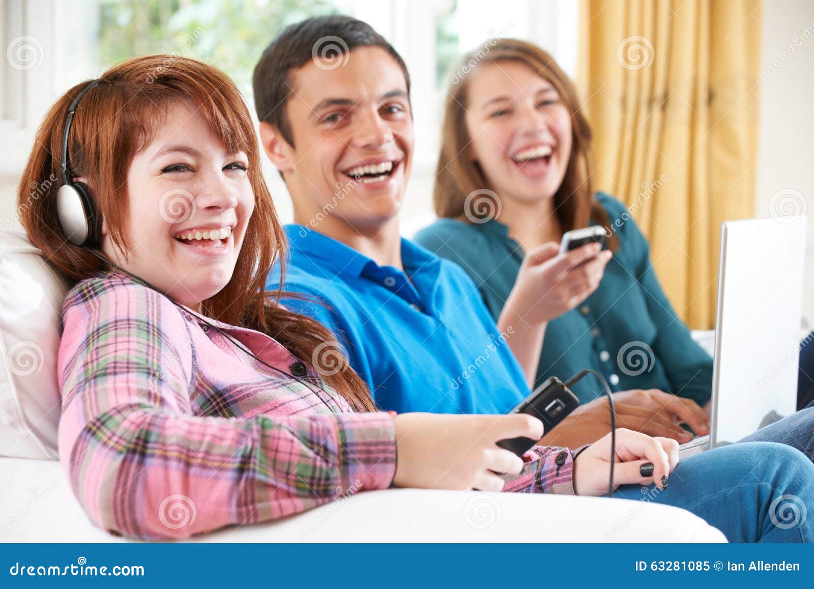 Group of Friends Using Digital Technology at Home Stock Image - Image ...