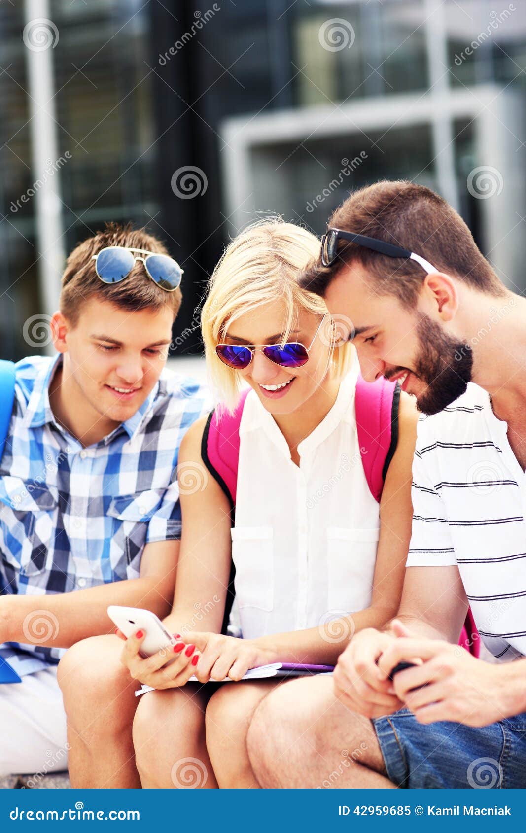 Group of Friends Using Smartphone in the Campus Stock Image - Image of ...