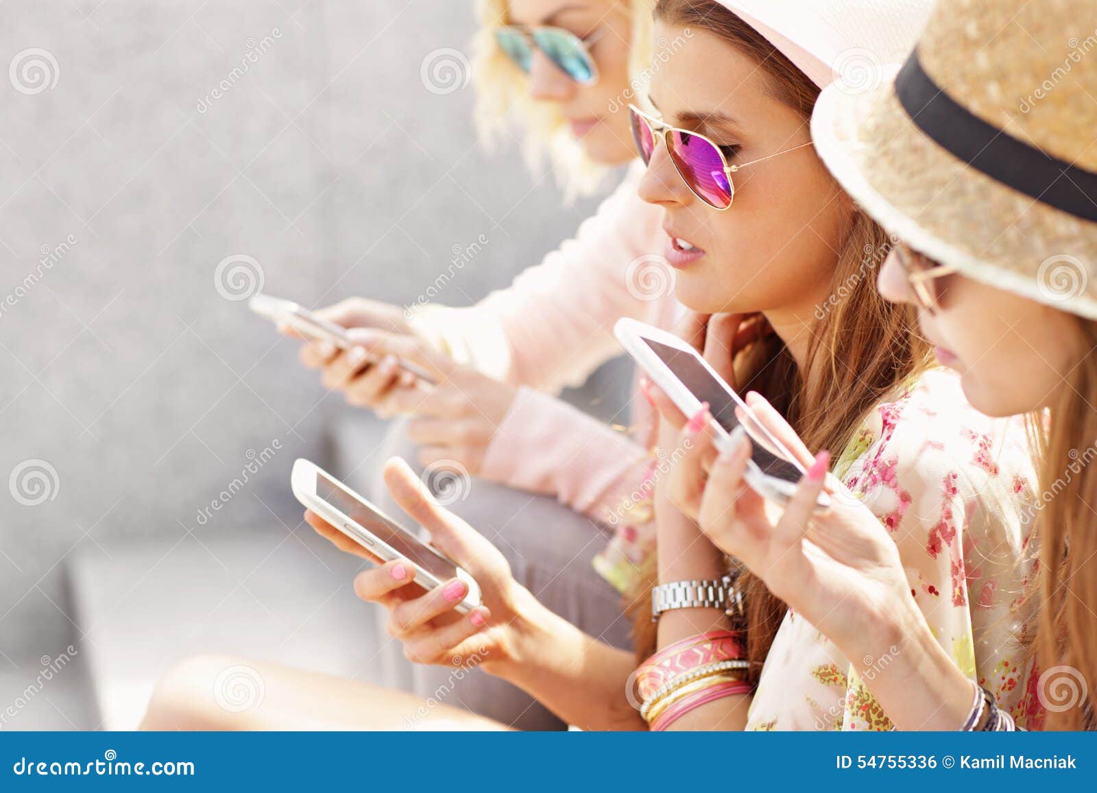 Group of Friends Using Smartphones in the City Stock Photo - Image of ...