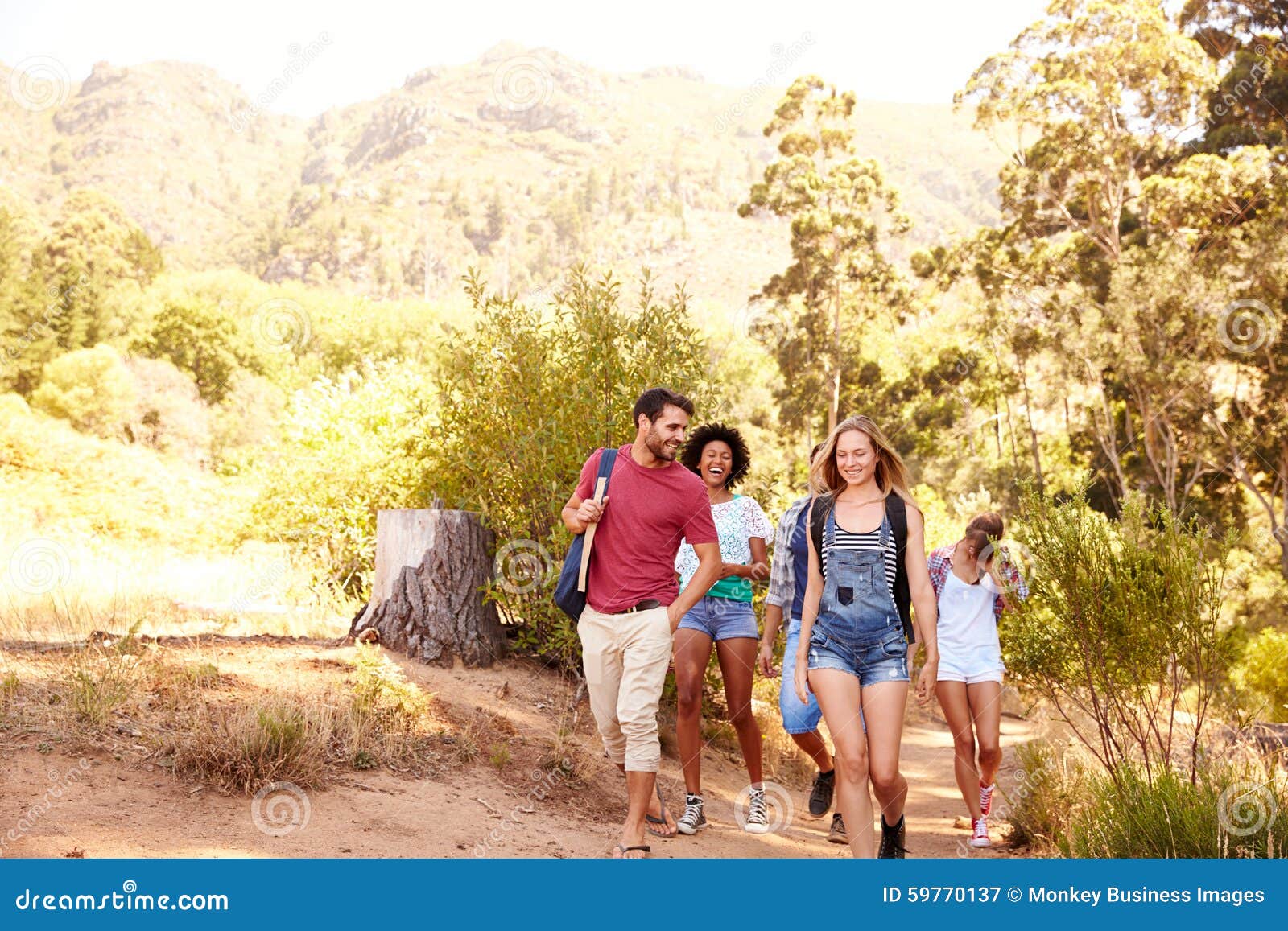 Group of Friends on Walk through Countryside Together Stock Image ...