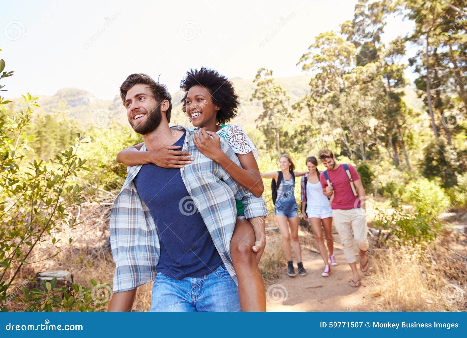 Group of Friends on Walk through Countryside Together Stock Image ...