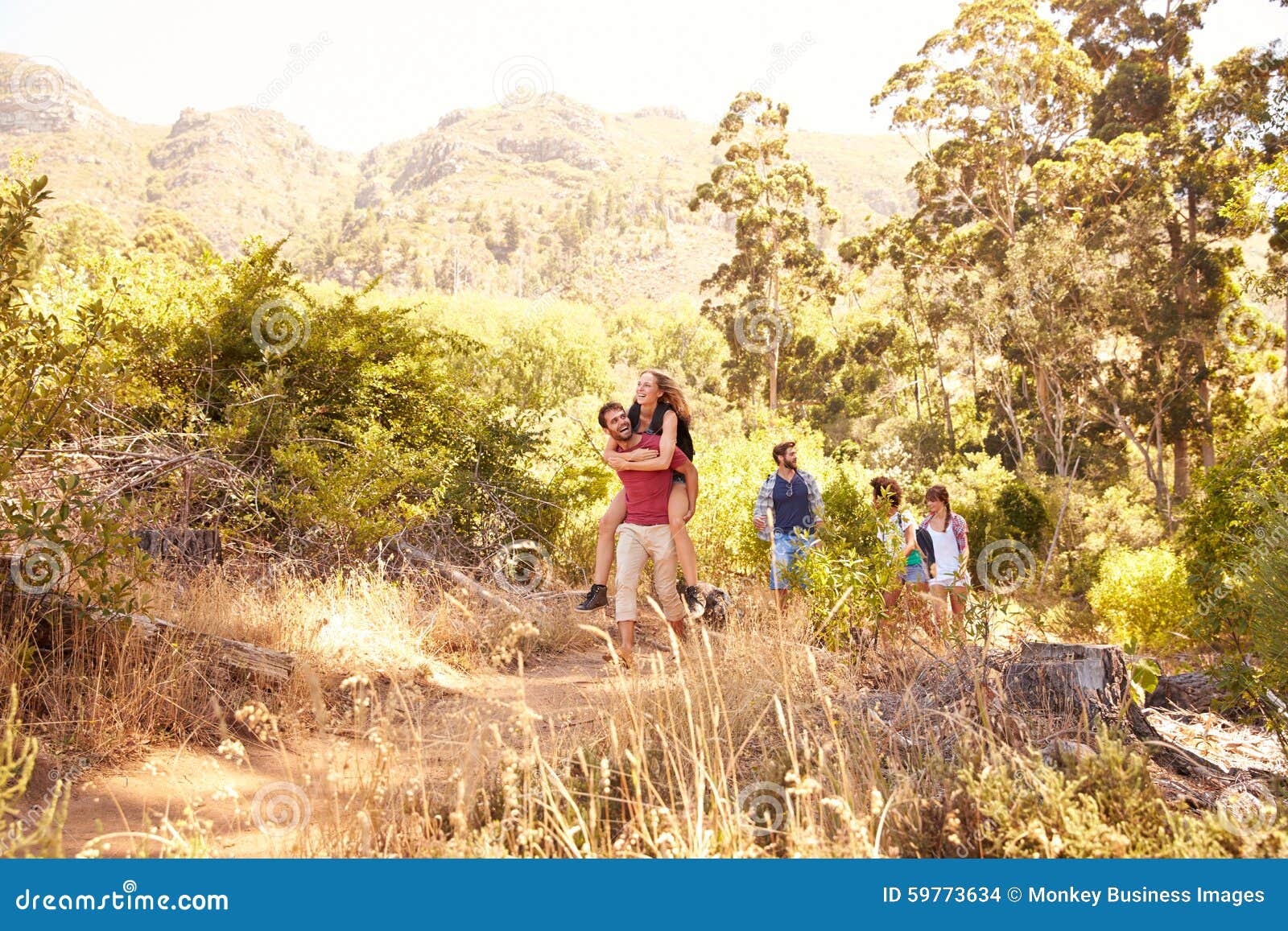 Group of Friends on Walk through Countryside Together Stock Photo ...