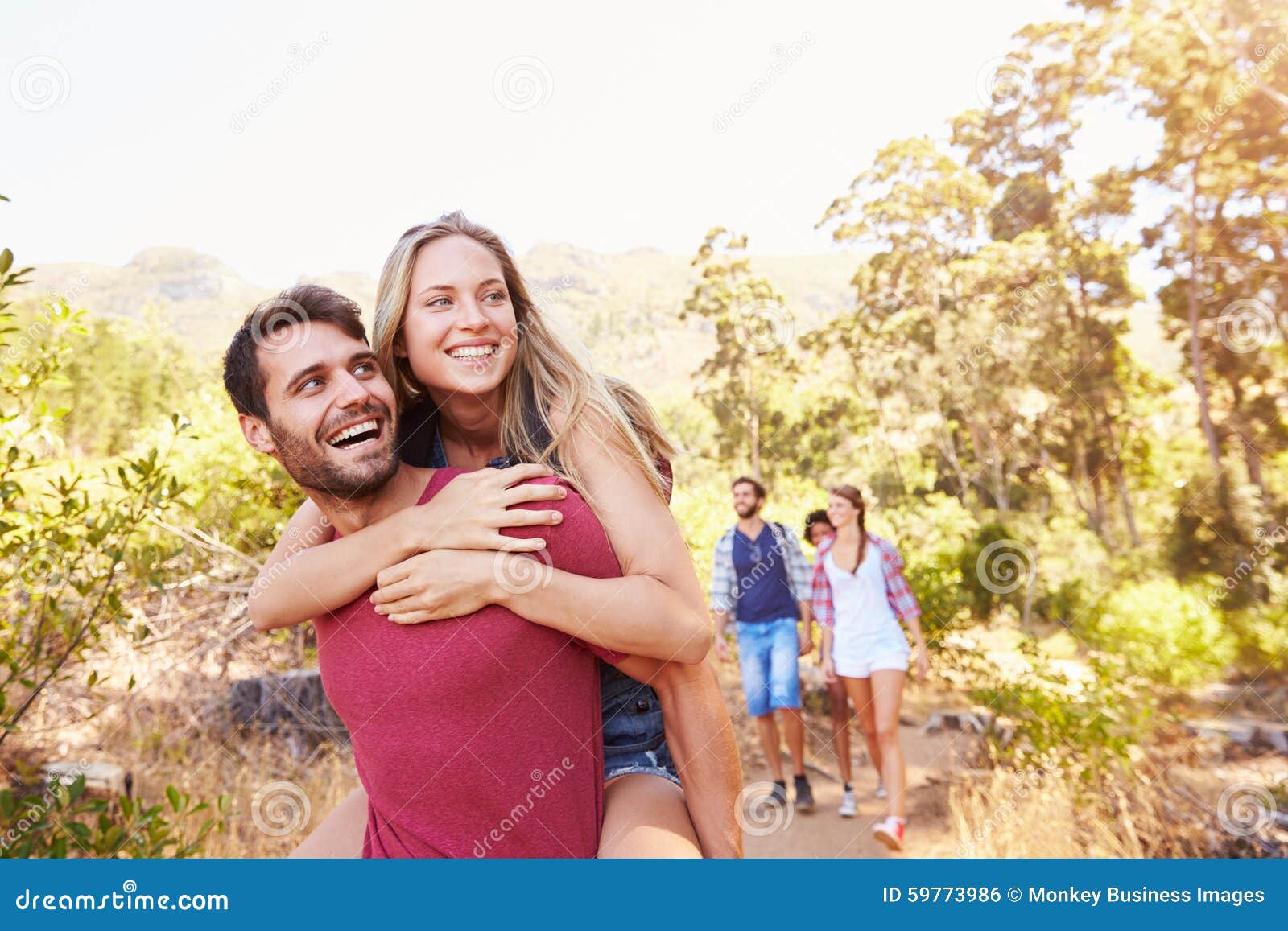 Group of Friends on Walk through Countryside Together Stock Photo ...