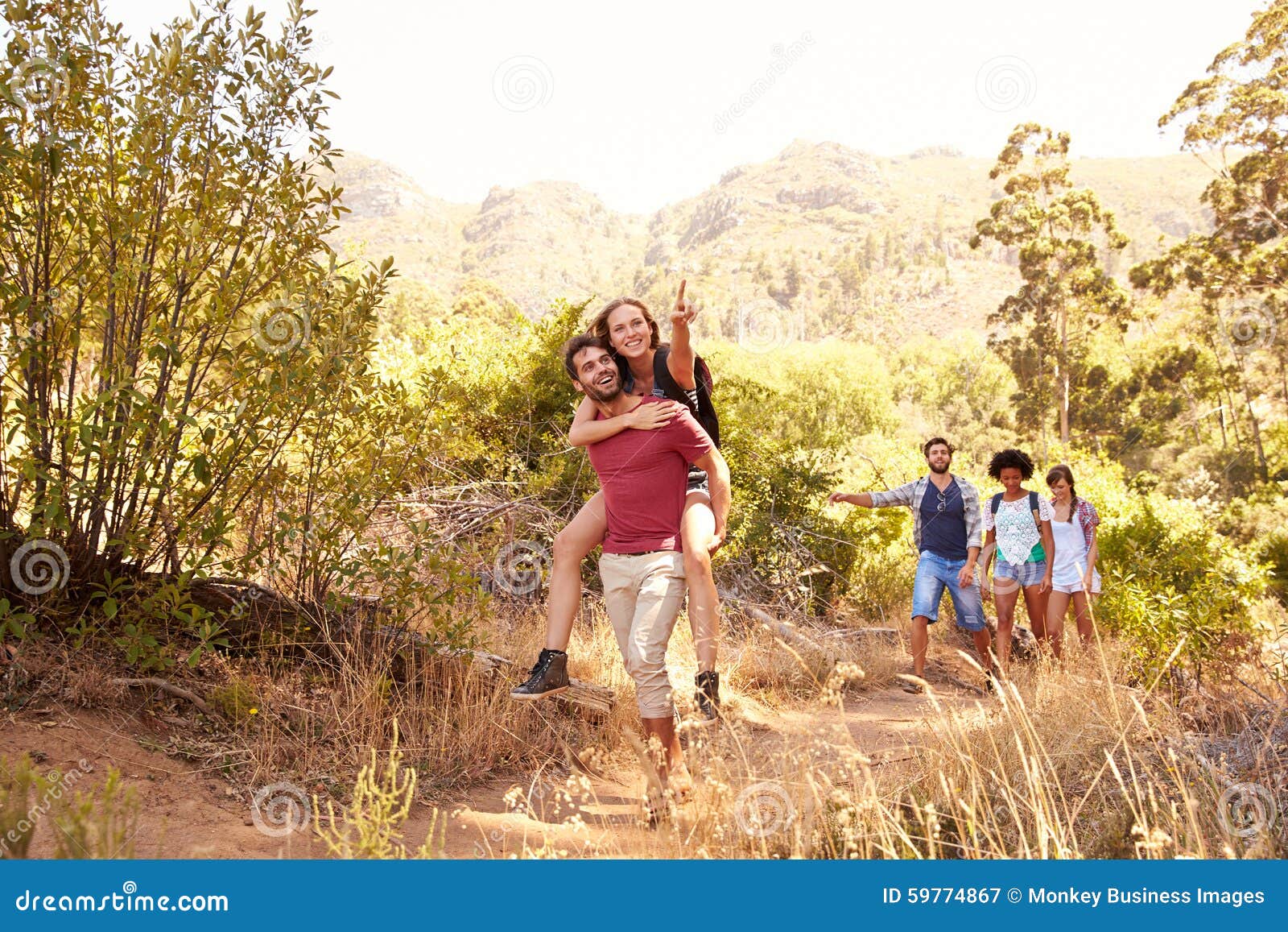 Group of Friends on Walk through Countryside Together Stock Image ...