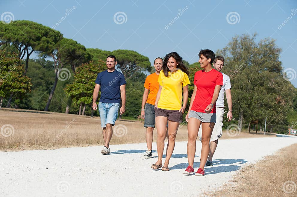 Group of Friends Walking Outside Stock Image - Image of relationship ...
